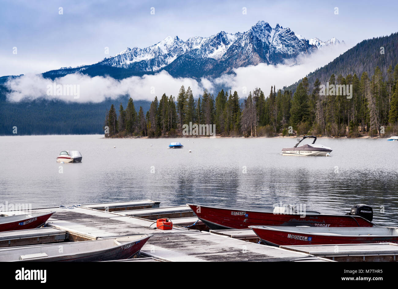 Heyburn Mountain over Redfish Lake, boats moored at marina, late fall ...