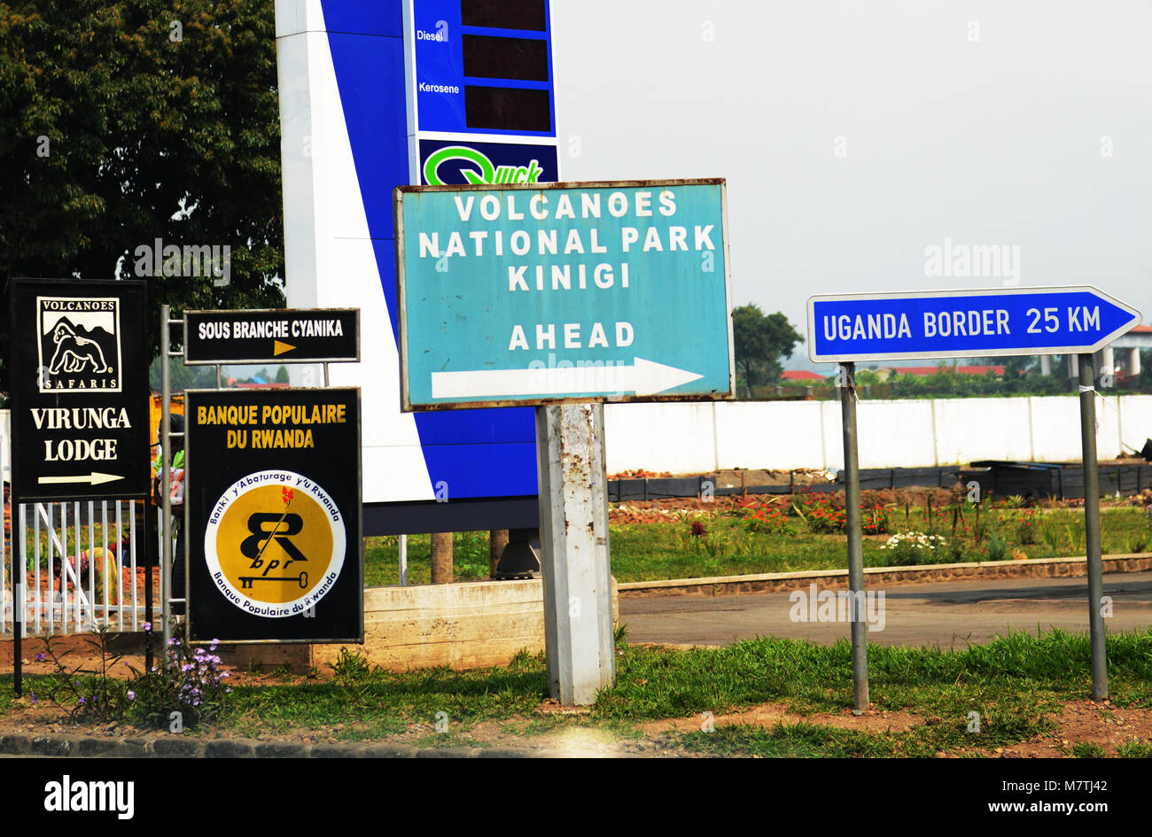 Road-signs to Volcanoes national park and t he Ugandan border Stock ...