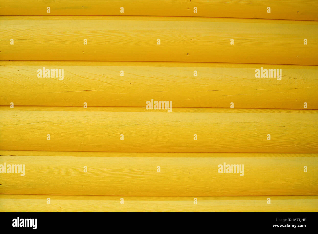 Yellow log wall abstract background Stock Photo - Alamy