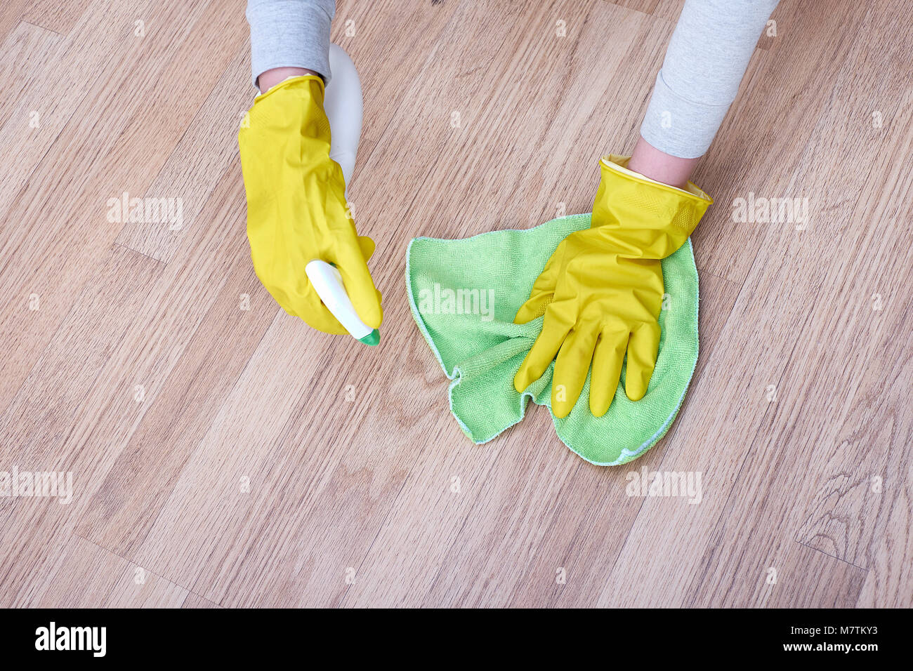 A picture of women hands in yellow gloves cleaning the floor Stock ...