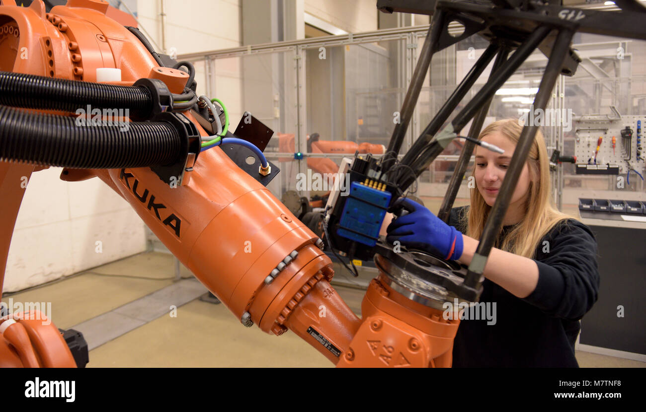 12 March 2018, Germany, Augsburg: Michaela Frank prepares a robot for ...