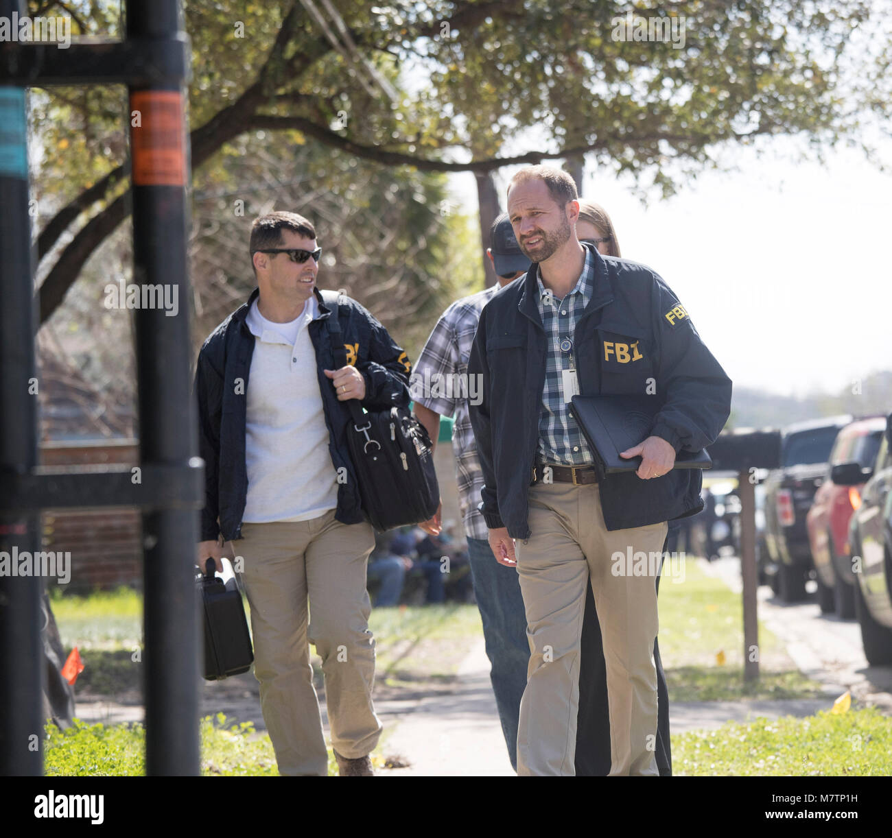 Agents from the FBI and Bureau of Alcohol, Tobacco and Firearms (ATF ...
