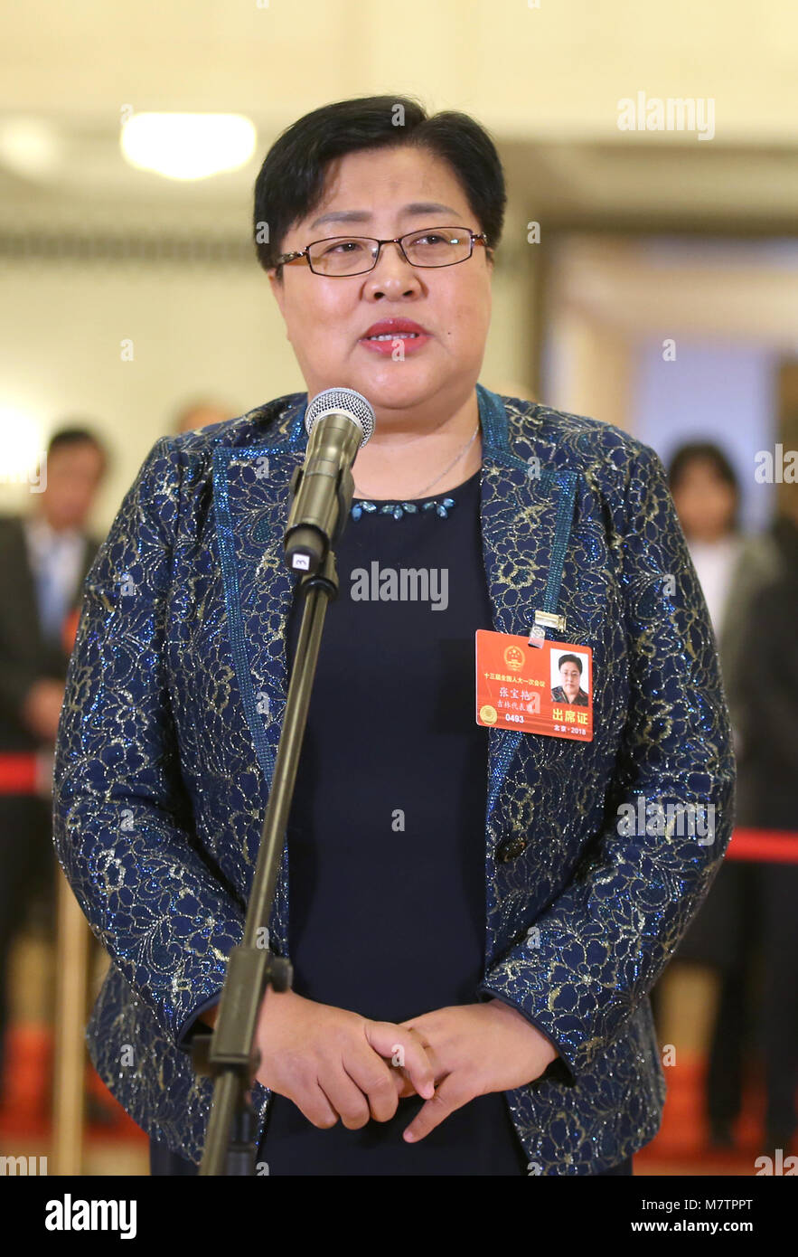 Beijing, China. 13th Mar, 2018. Zhang Baoyan, a deputy to the 13th ...