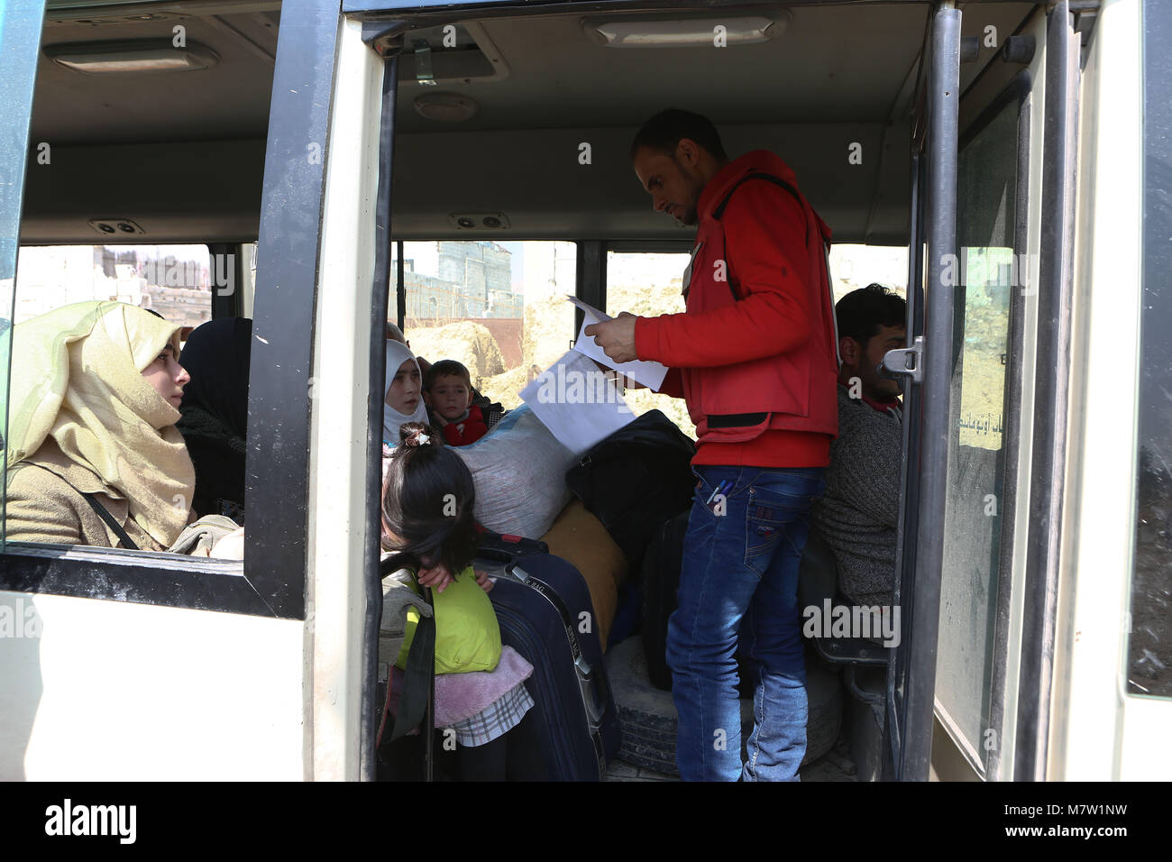 Douma, Eastern Ghouta province, Syria. dpatop - People ride on a Syrian ...