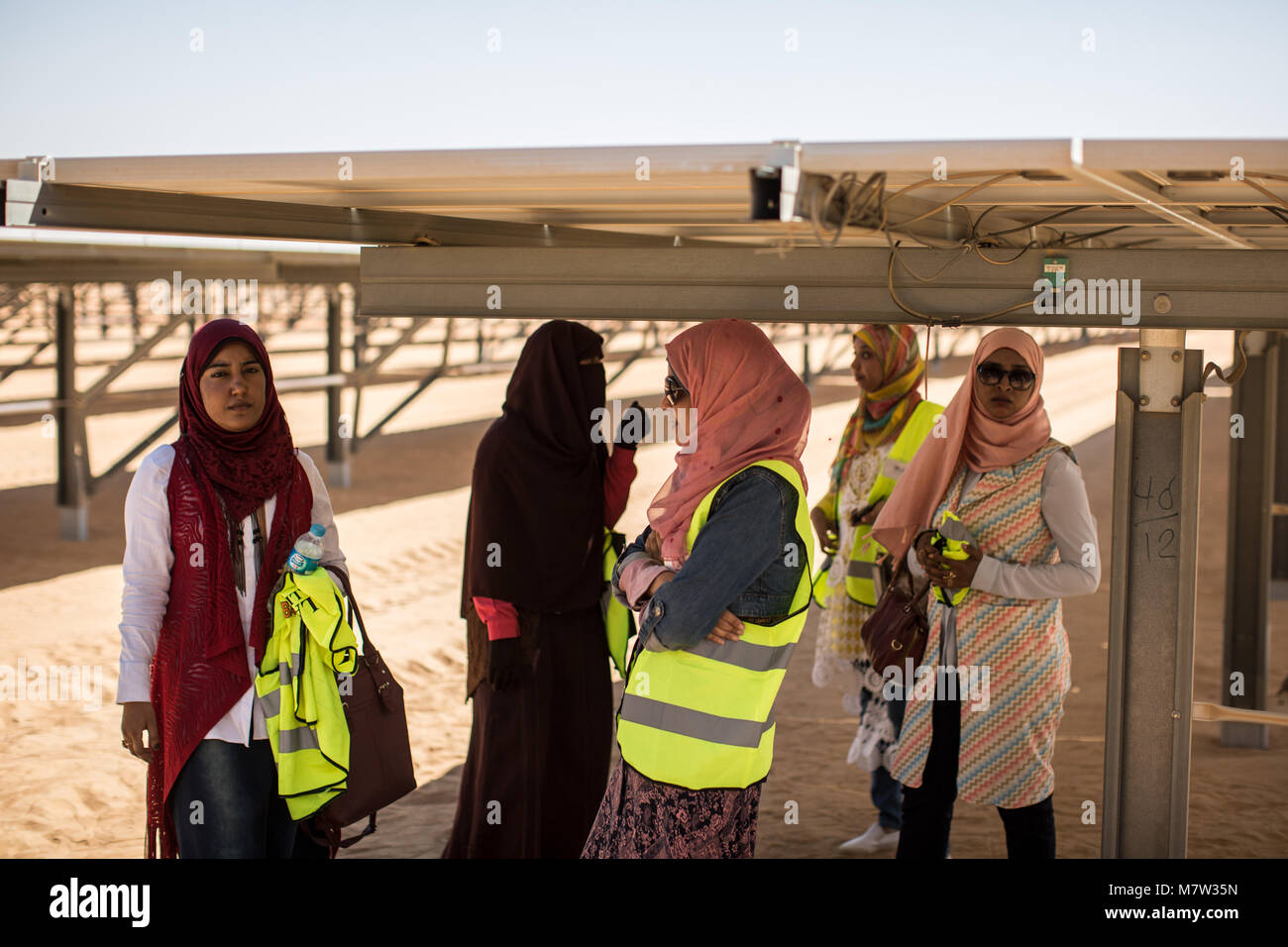 Aswan, southern Egypt, 13 March 2018. Women seek shelter from the sun ...