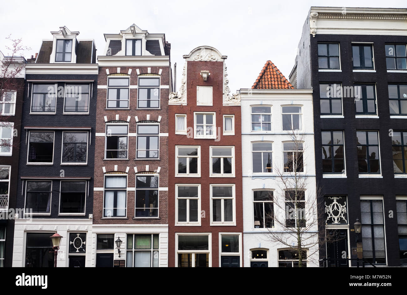 Traditional old color contrasted dutch buildings in Amsterdam Stock ...