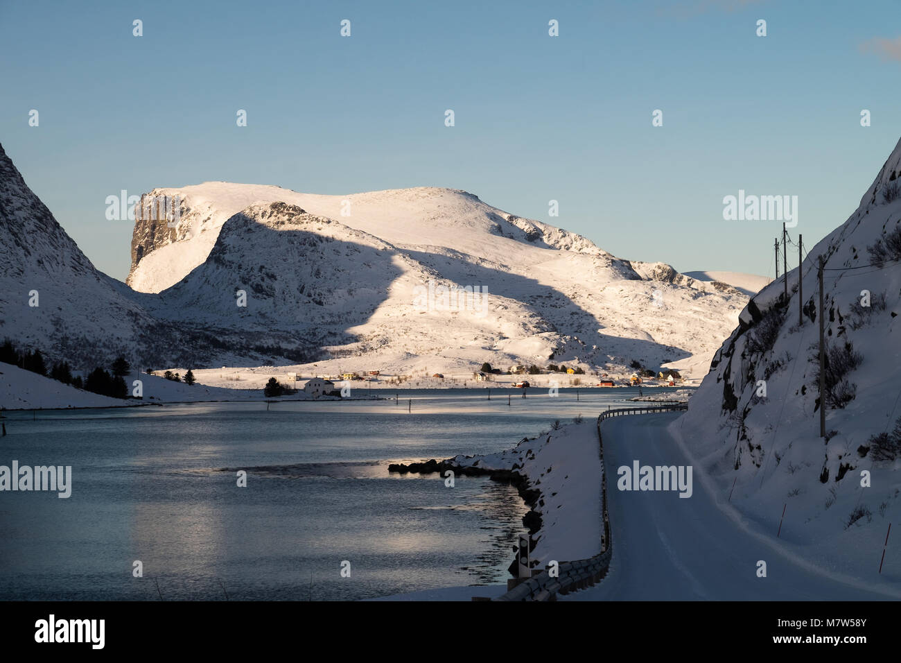Snow covered roads and peaks in Lofoten wintertime, Norway Stock Photo ...