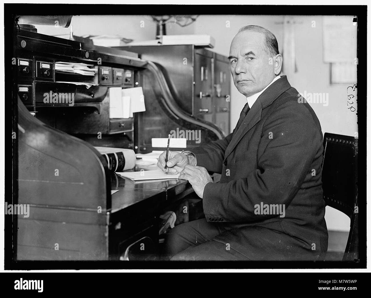 A portrait of T.K. Giragosian, a notable figure likely from the early ...