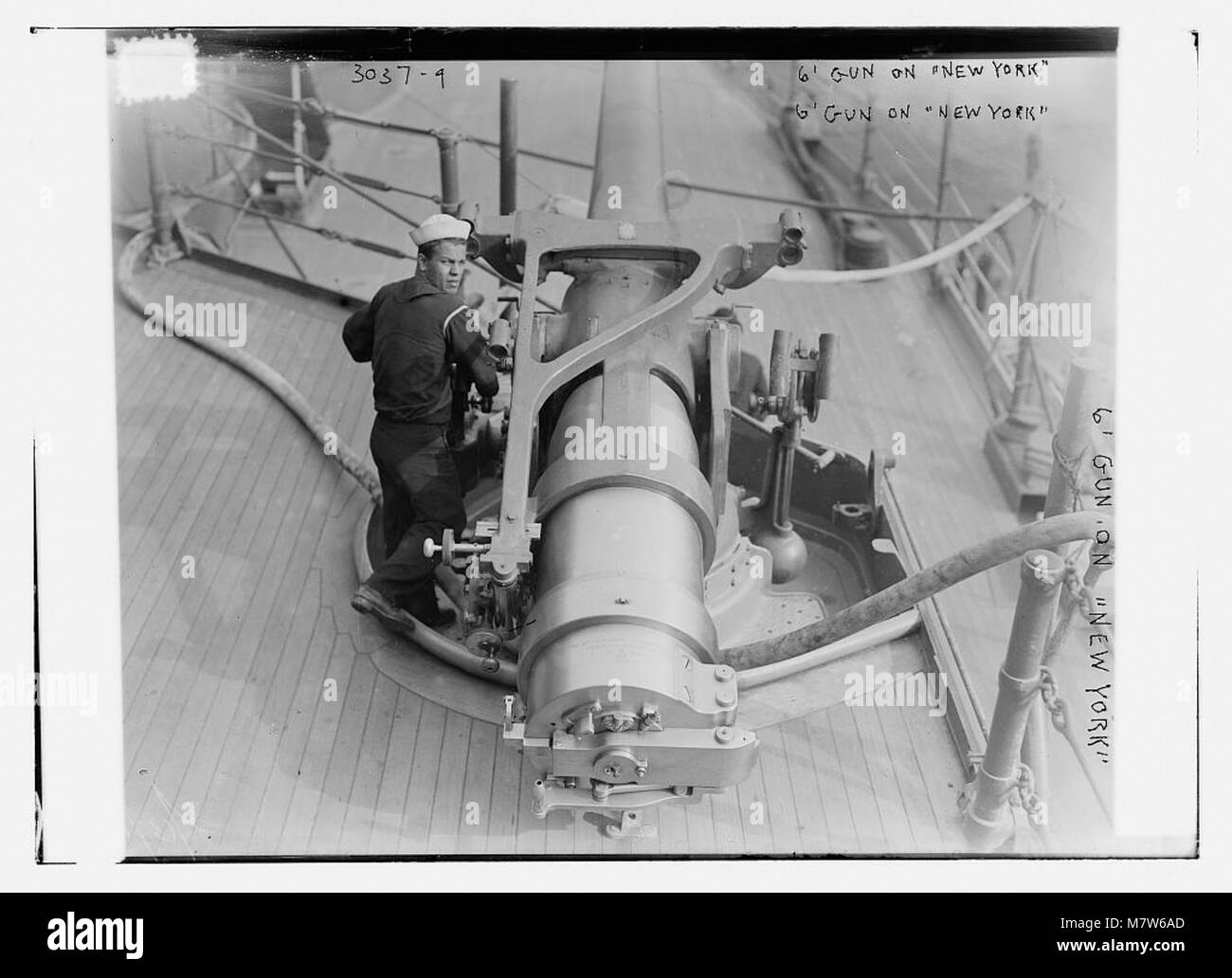 A historical photograph of a 6' gun mounted on the U.S. Navy ship, USS ...