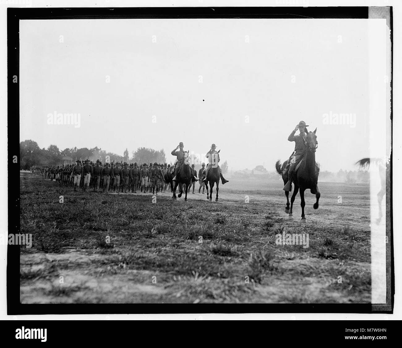 A historical photograph capturing a marine review held on August 24 ...