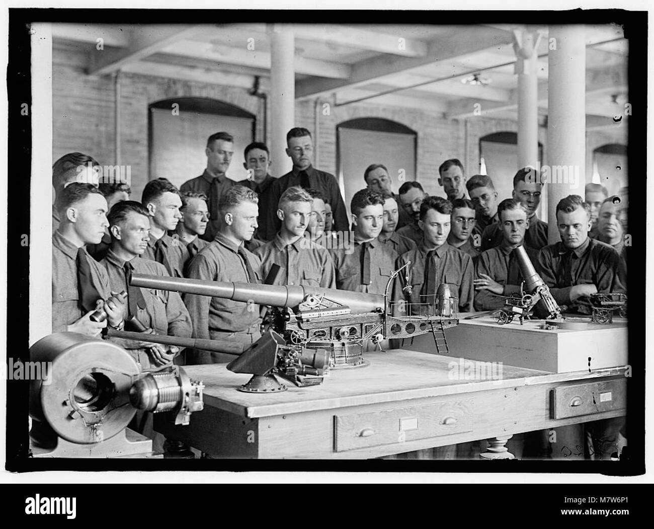 This image shows a military training session, focusing on the ...
