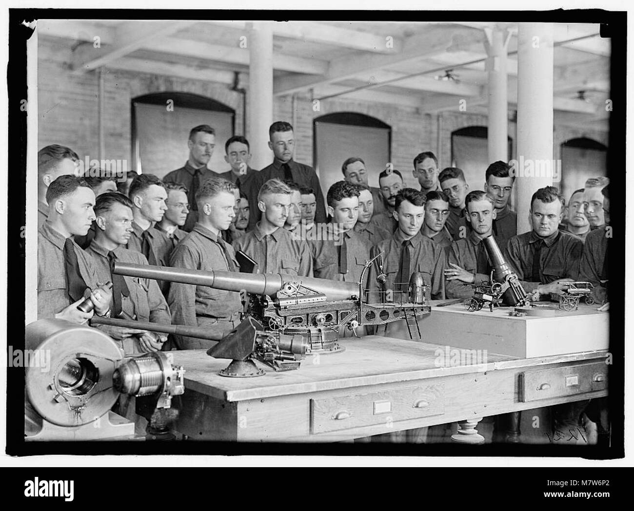 A photograph depicting military training, showcasing soldiers in ...