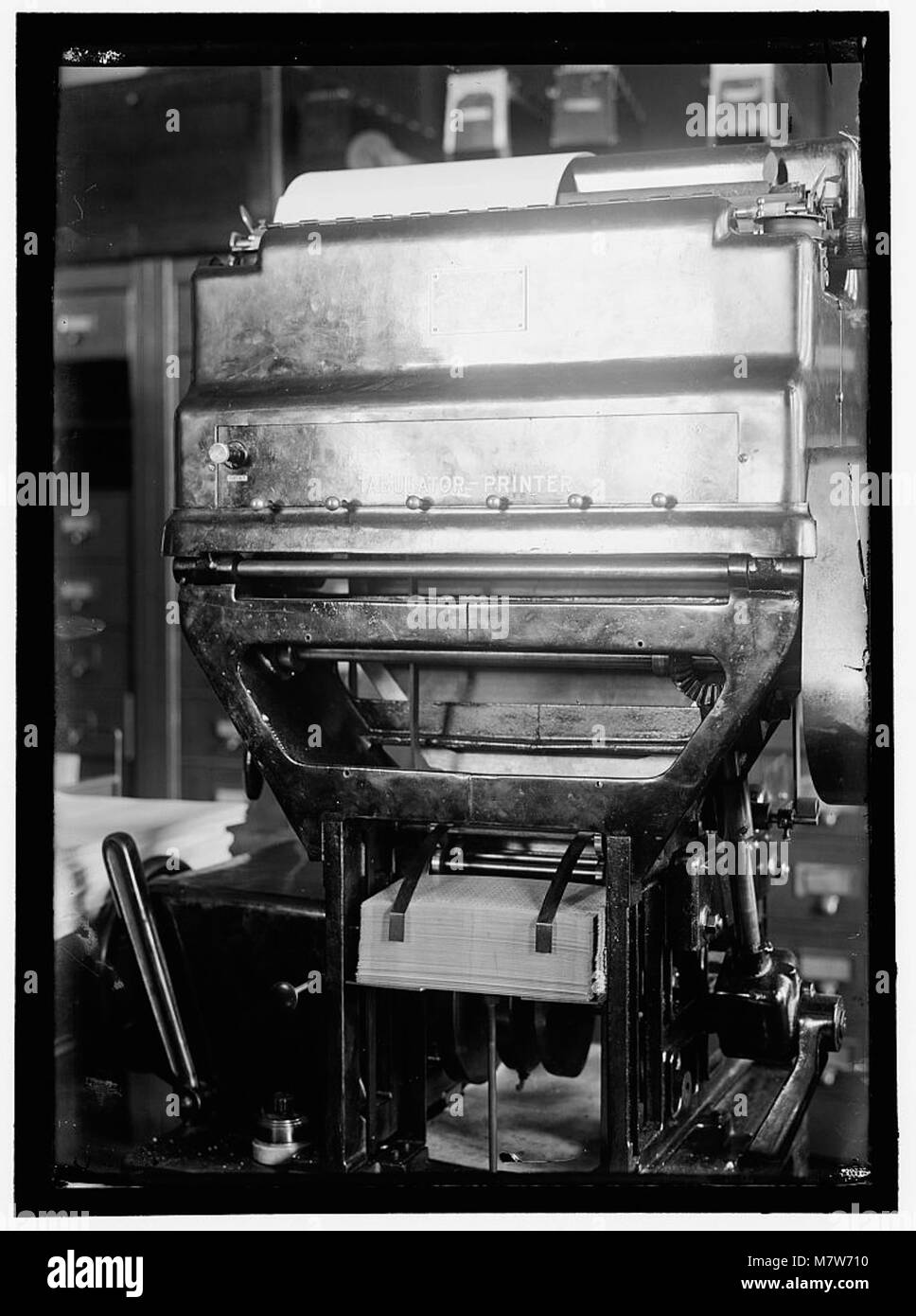 This photograph depicts a U.S. Navy tabulator-printer machine used by ...