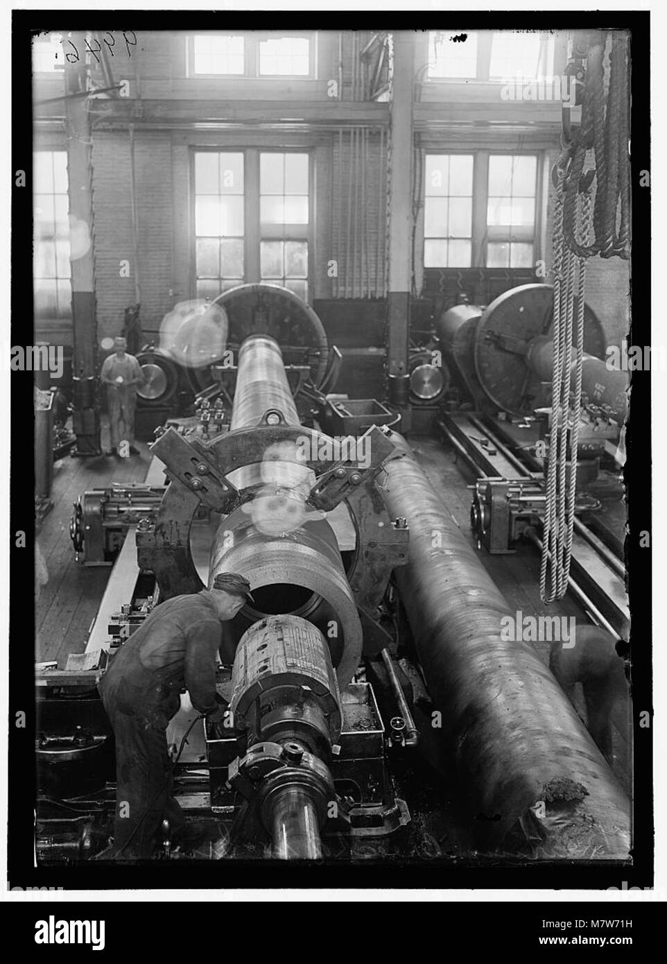 A historical image of the boring breach process of a 14-inch gun at the ...