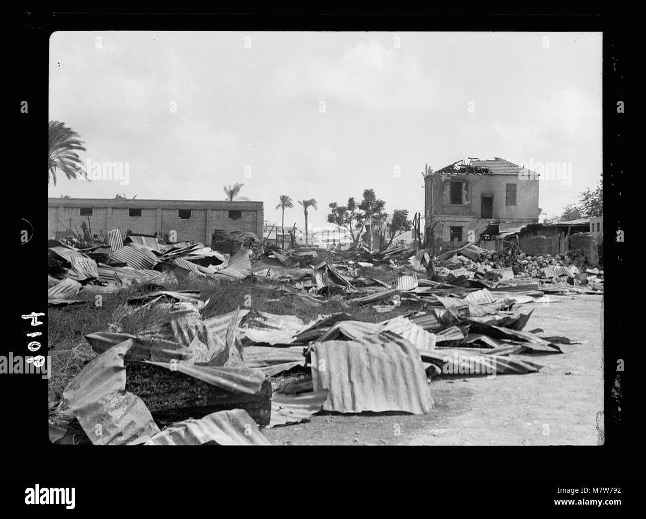 A historical image showing the destruction of a Jewish lumber yard in ...