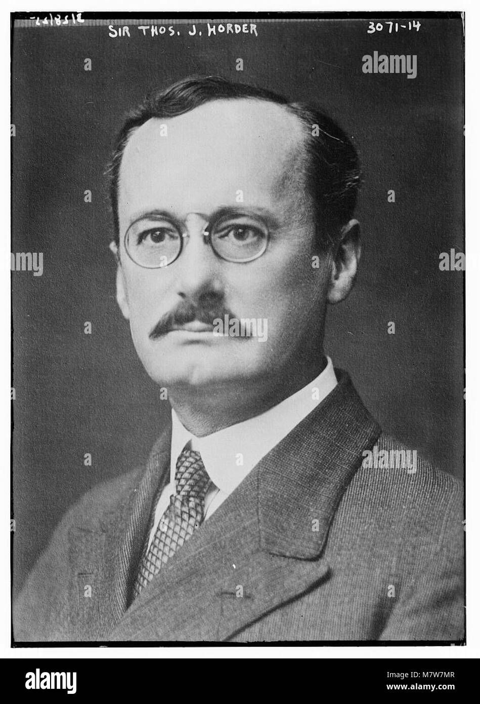 A formal portrait of Sir Thomas J. Horder, a notable historical figure ...