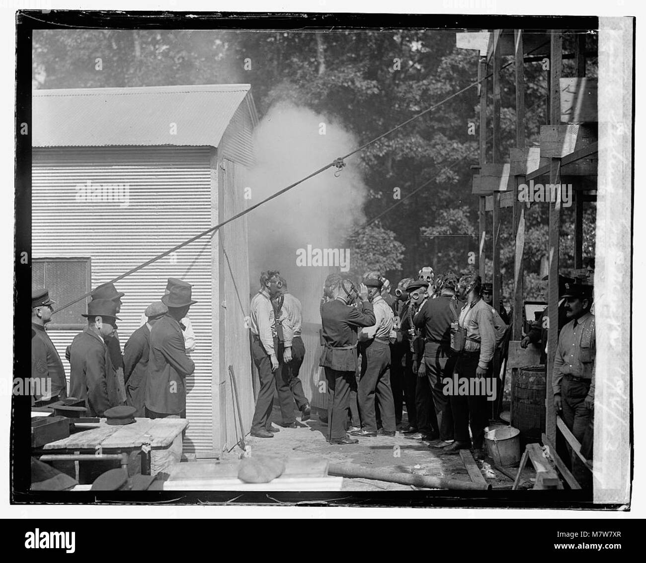 This image captures the testing of gas masks on October 4, 1923. The ...