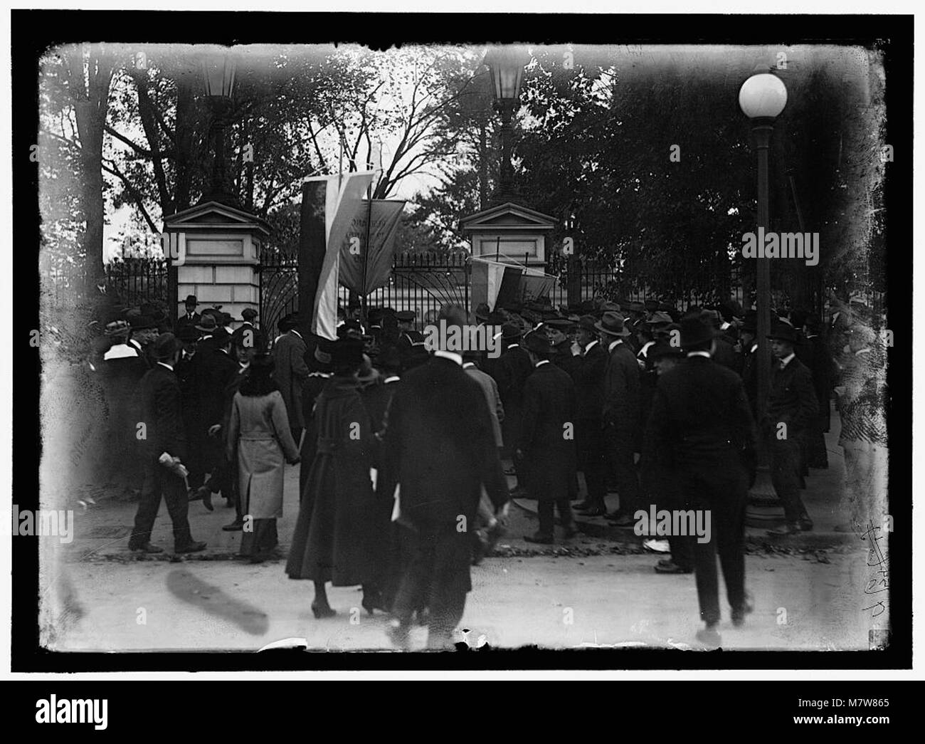 A historical photograph documenting arrests related to the women’s ...