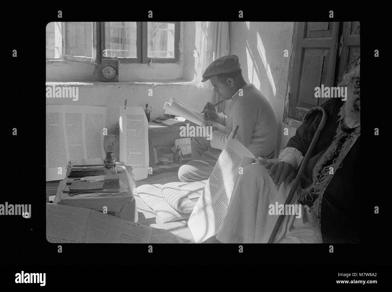 This image depicts Yemenite Jewish scribes, known for their meticulous ...