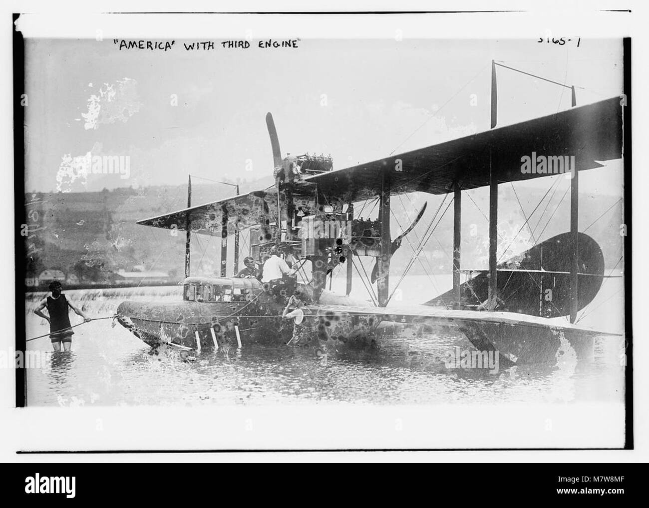 A photograph of an aircraft labeled 'AMERICA' equipped with a third ...