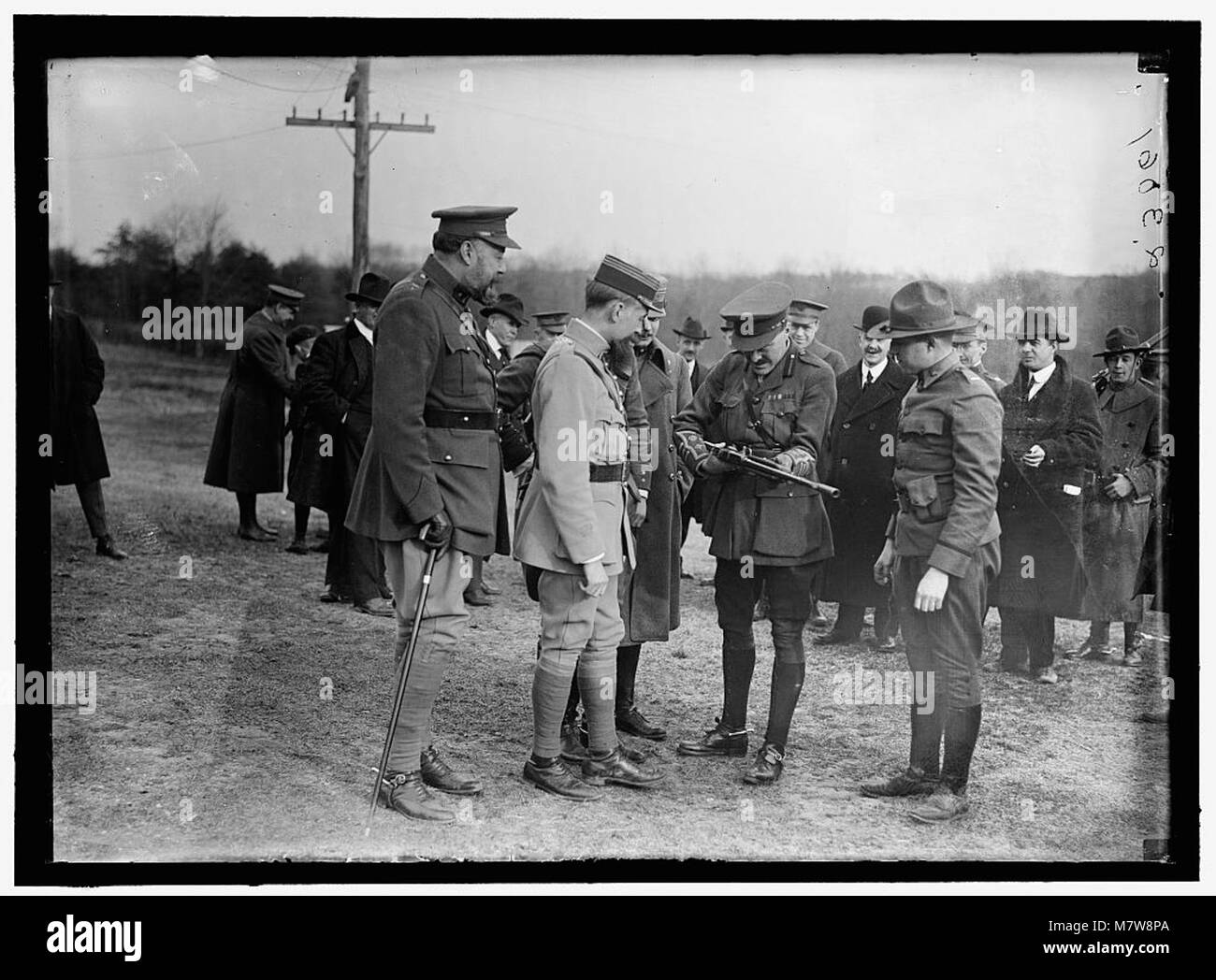 A photograph documenting U.S. Army rifle tests, capturing soldiers ...