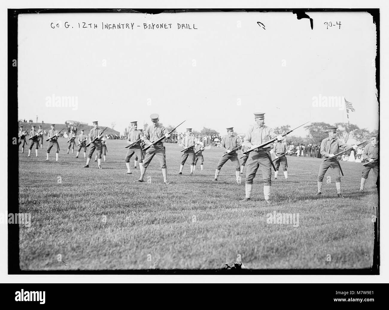 Soldiers from Company G, 12th Infantry, perform bayonet drills, demonstrating their military ...
