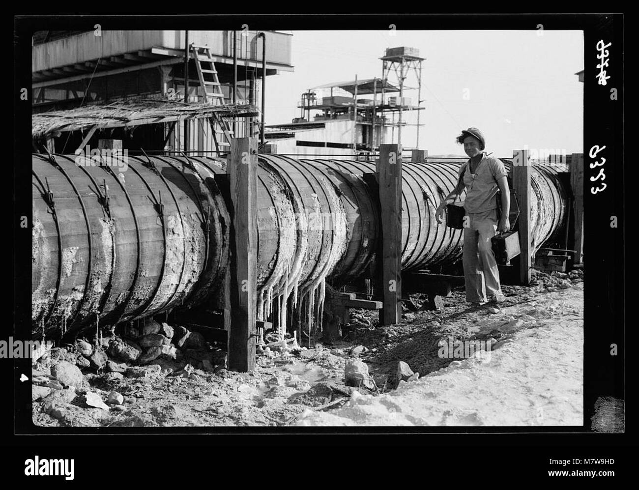 The image shows a four-foot wooden pipe transporting Dead Sea water to ...