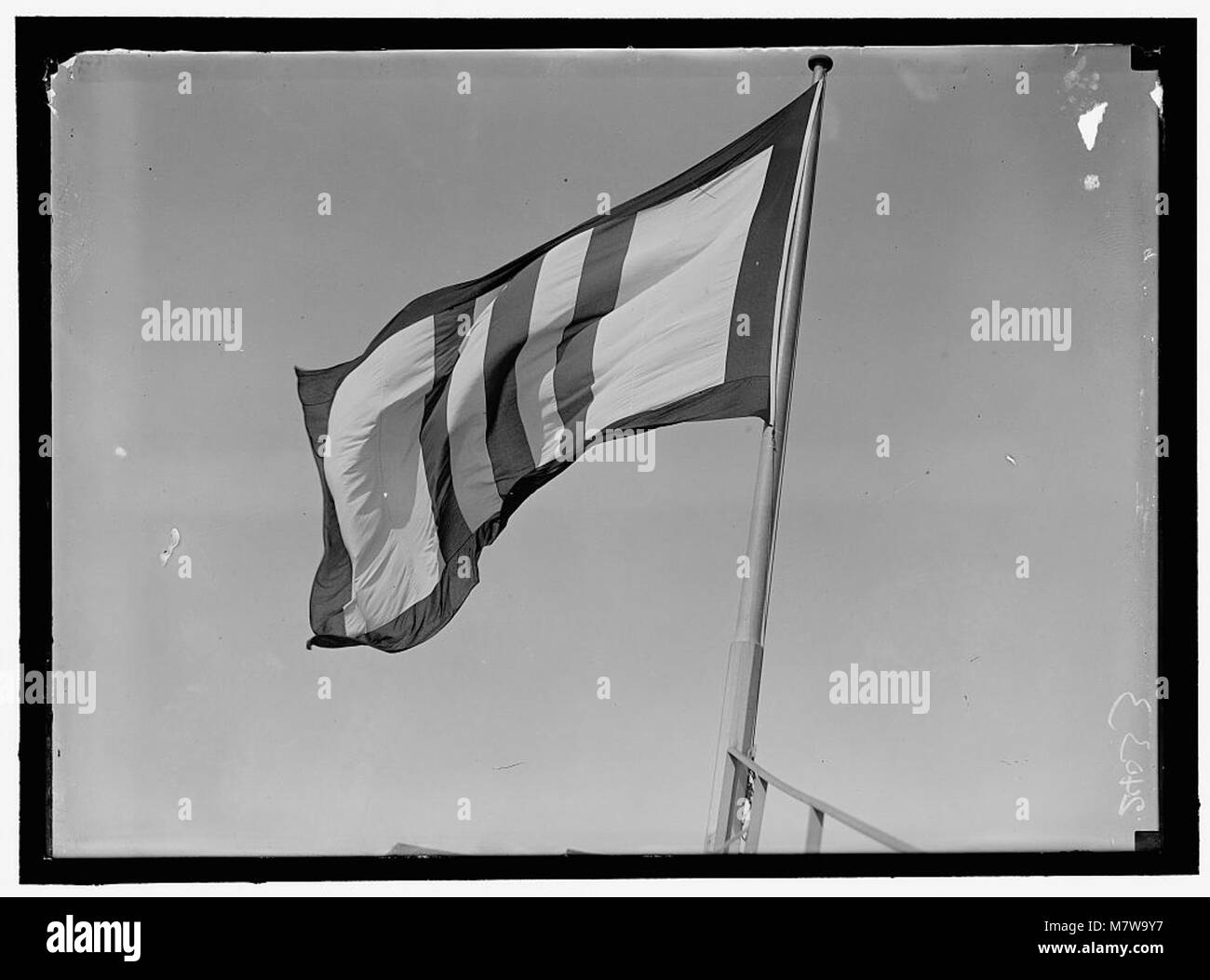 A collection of flags displayed together, representing various nations ...