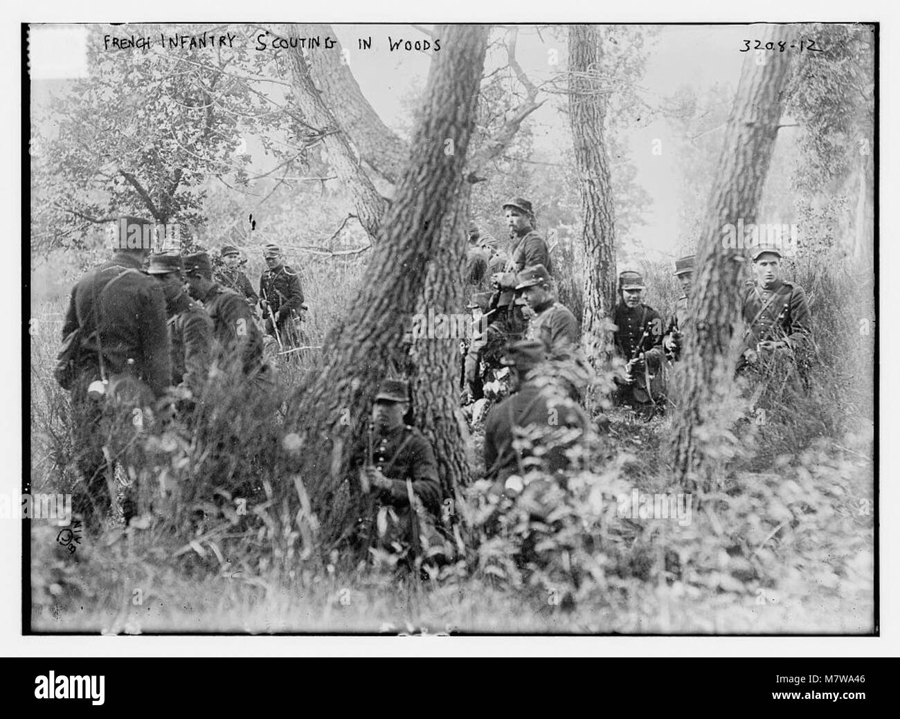 French infantry soldiers are depicted scouting in the woods, possibly ...