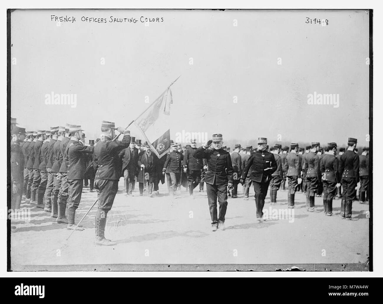 A historical scene featuring French officers saluting the colors, a ...