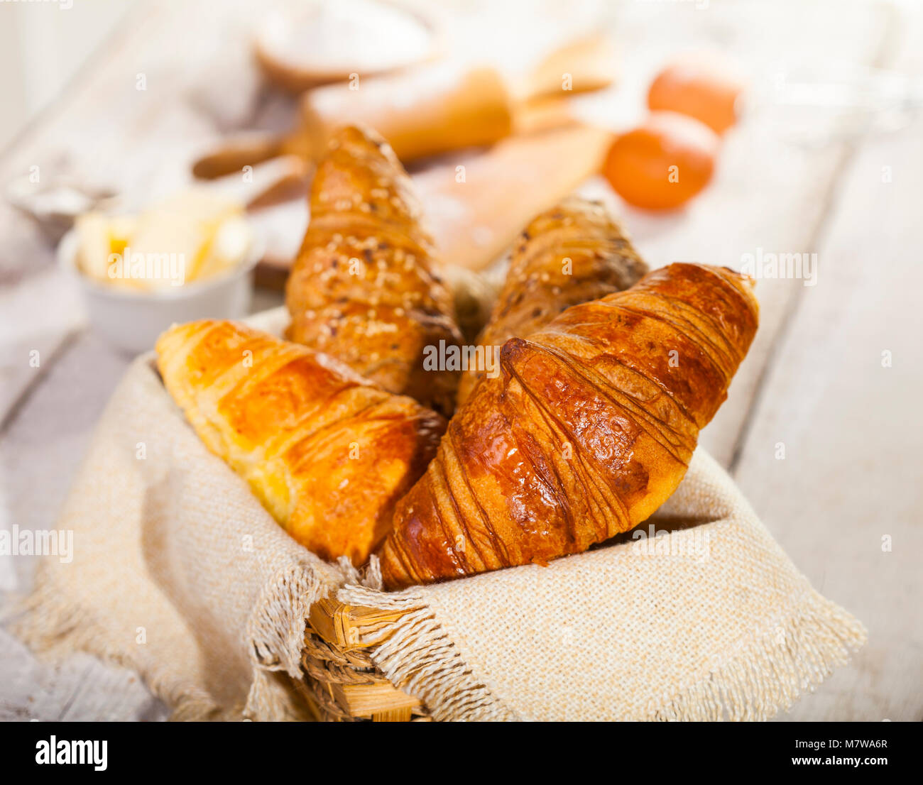 Baked croissants and ingredients for the preparation of bakery products ...