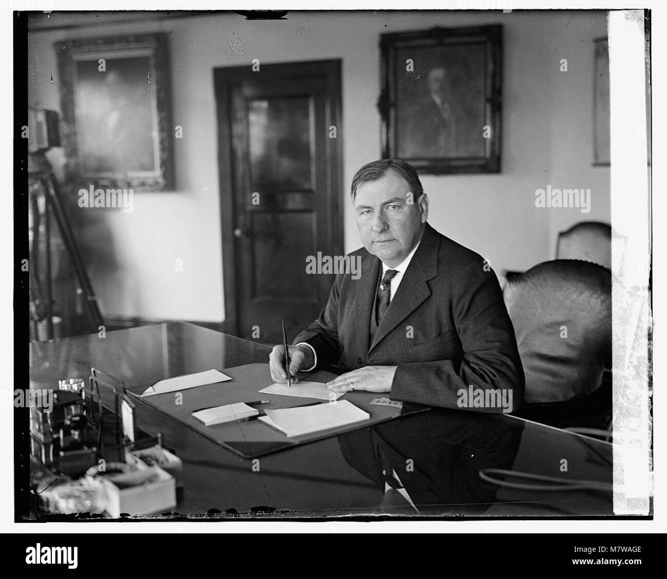A photograph of Harlan F. Stone at his desk, taken on April 9, 1924 ...