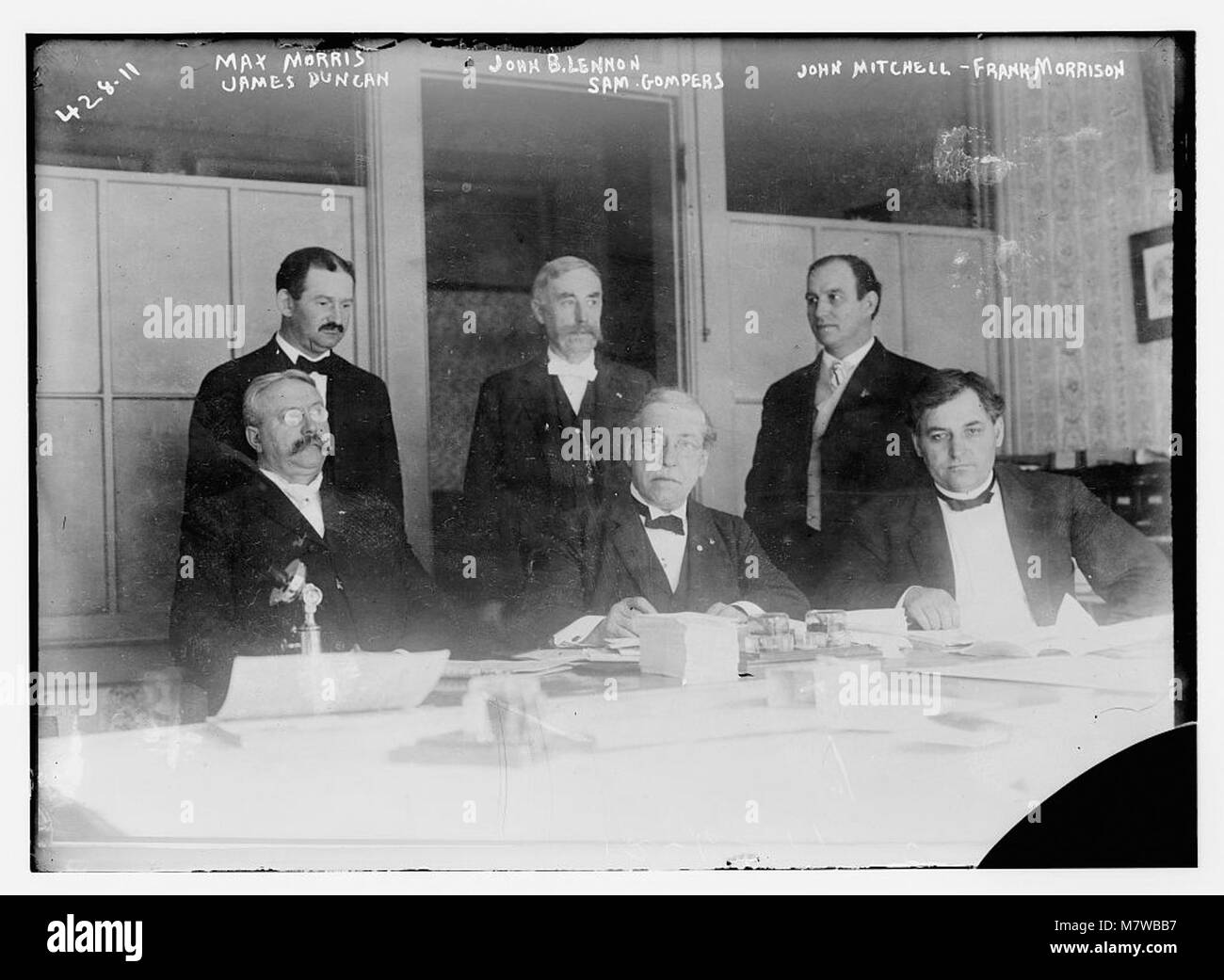 A historical photograph featuring prominent labor leaders including Max ...