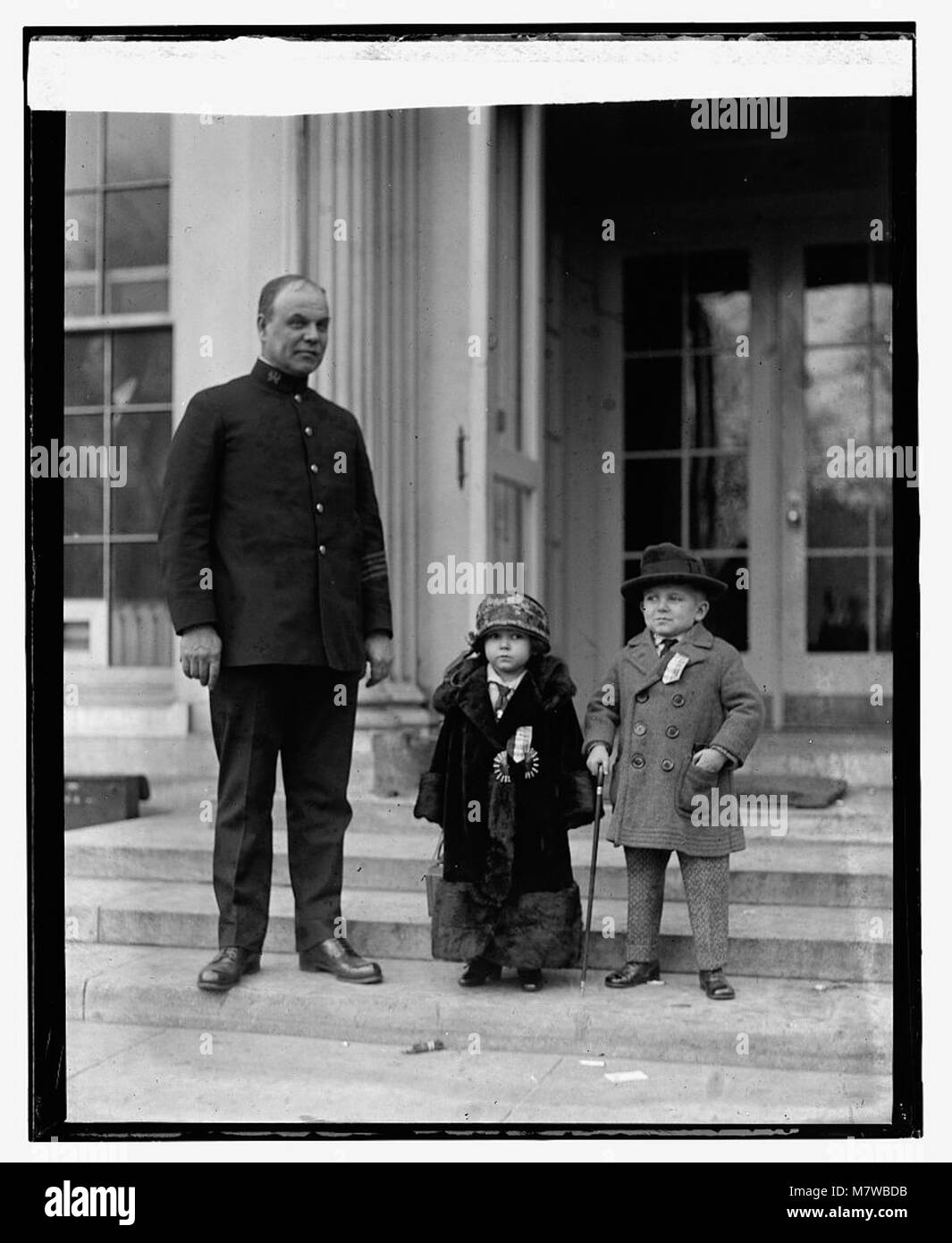 This photograph, taken on January 23, 1924, features a group of midget ...