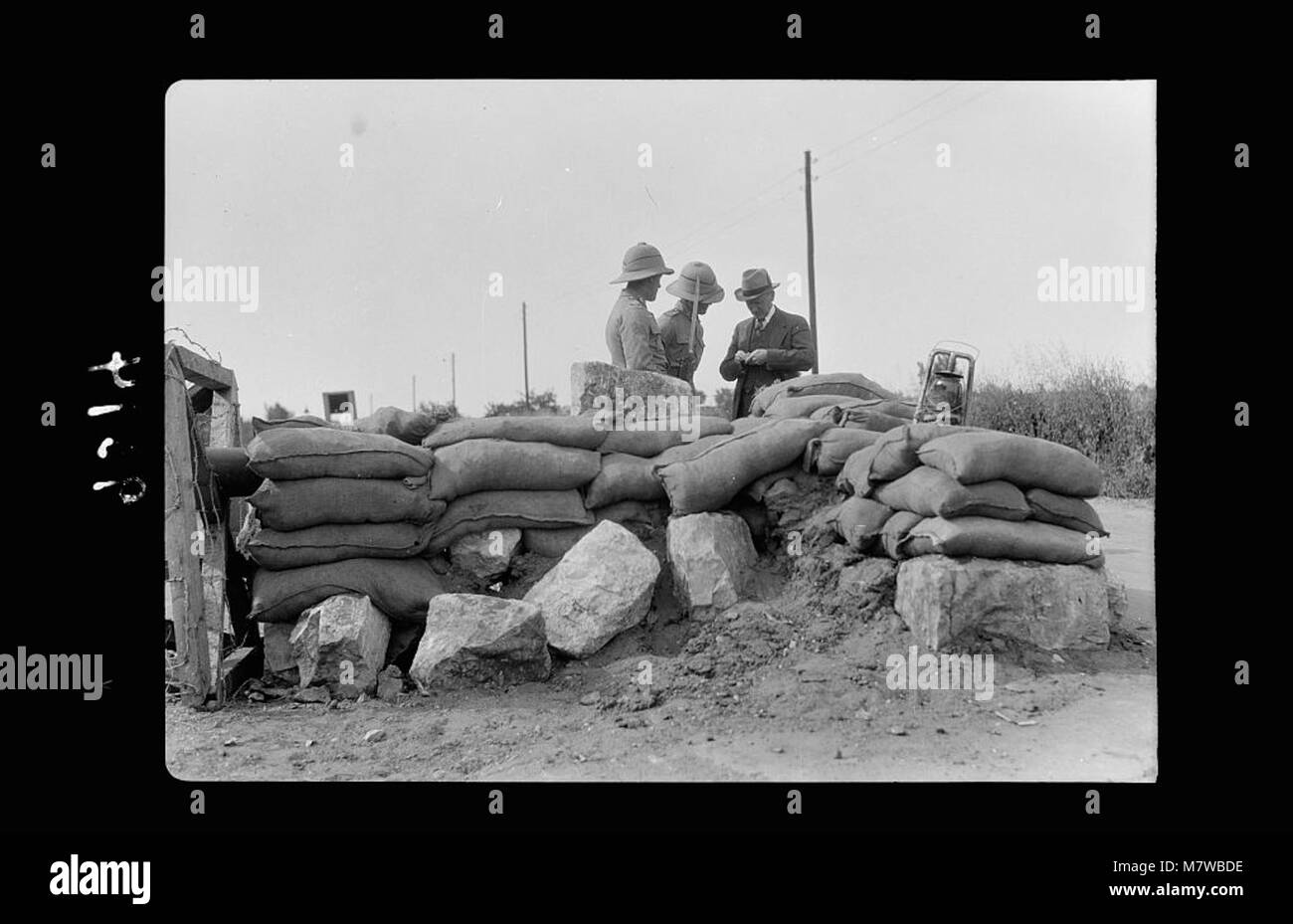 Military road block at junction Ramleh-Lydda Road, later with shade ...