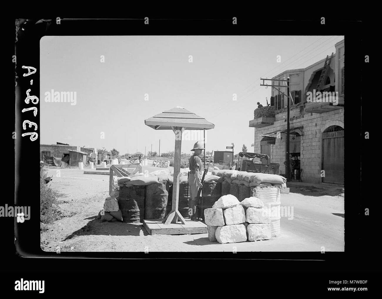 A military roadblock at the junction of the Ramleh-Lydda Road, later ...