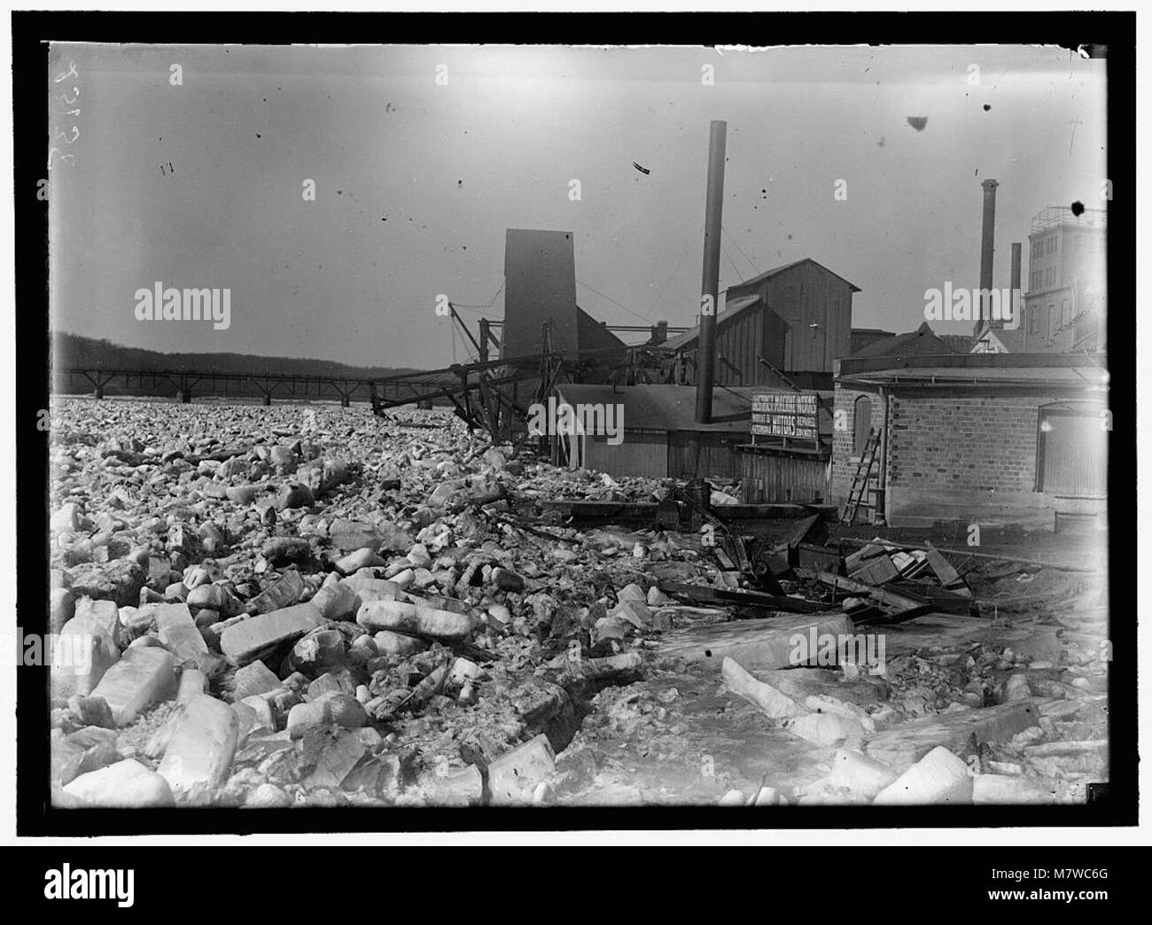 The photograph depicts ice jams along the Potomac River. Ice jams occur ...
