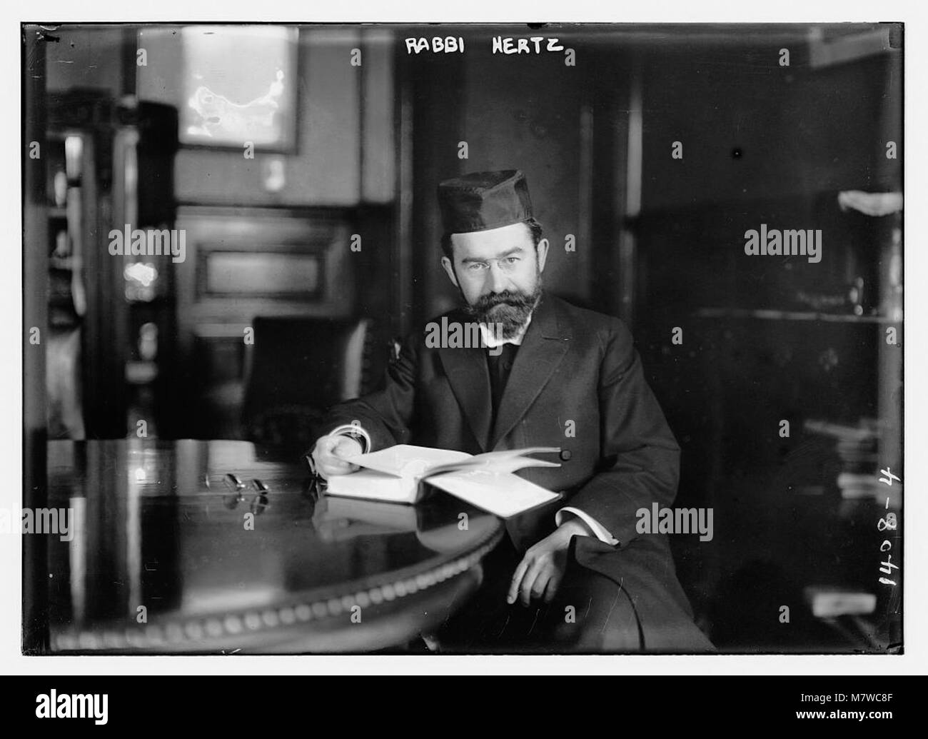 A formal portrait of Rabbi Hertz, a prominent religious leader ...