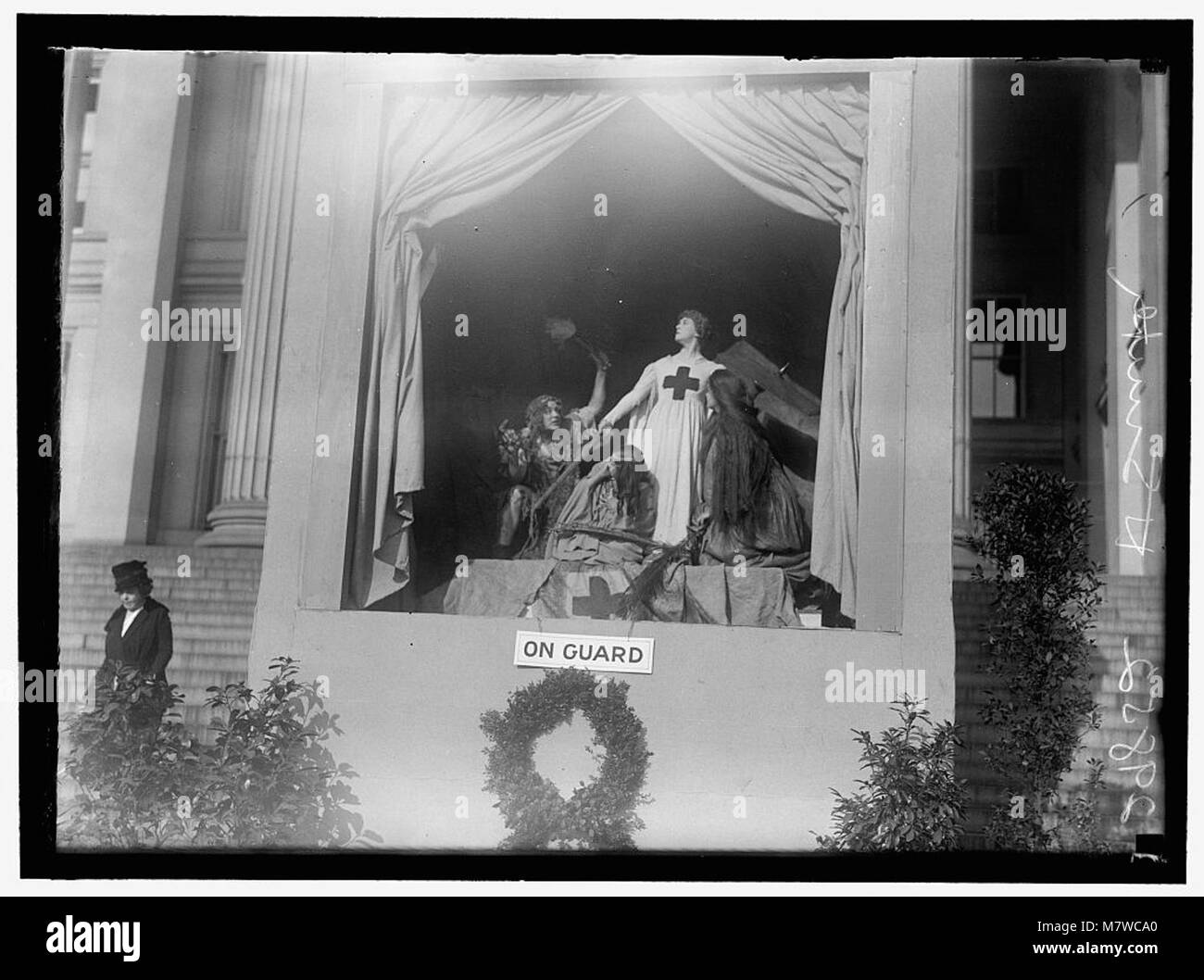 The image shows a Red Cross demonstration, with a tableaux performance ...