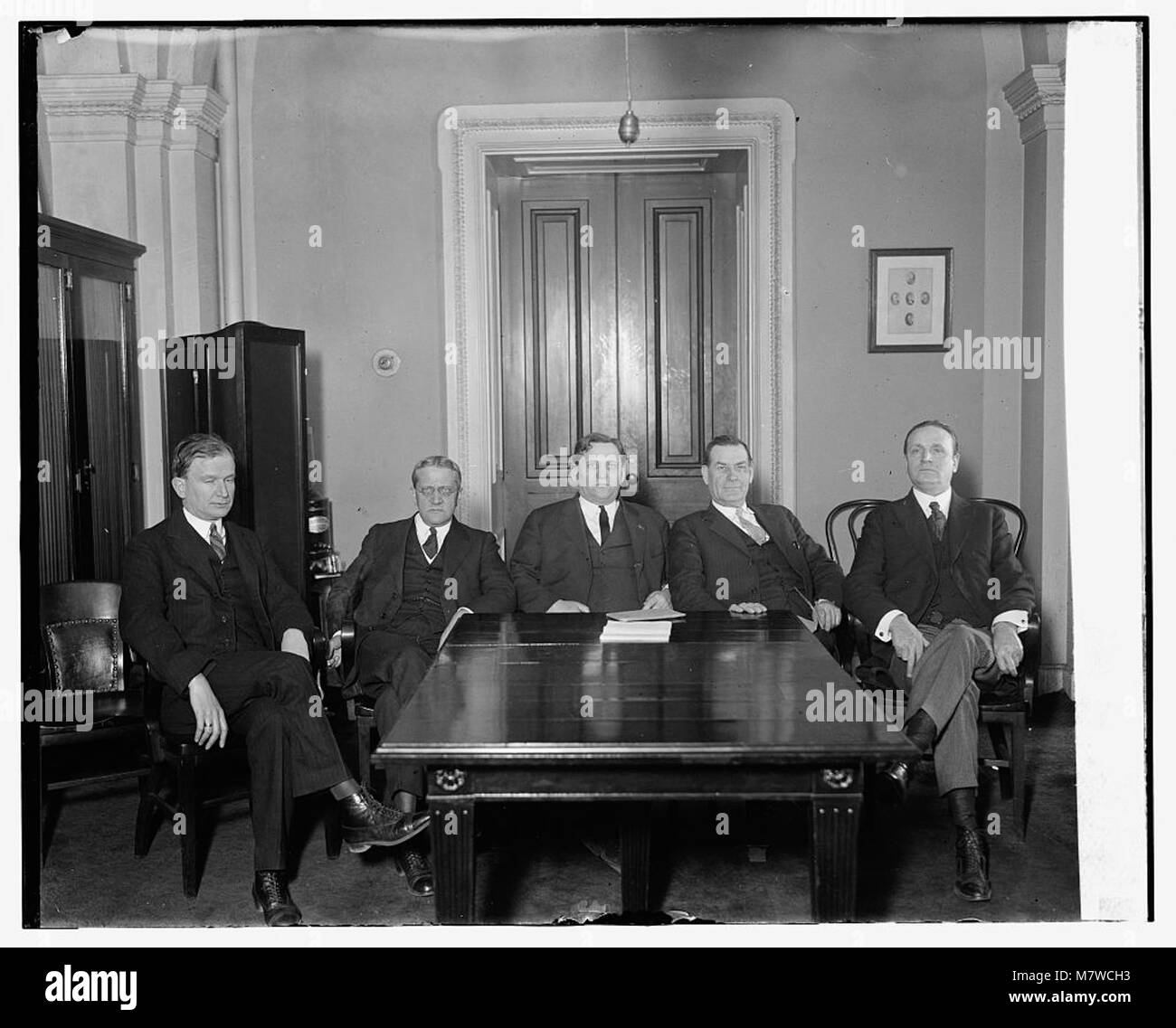 Senator Smith W. Brookhart is captured with a group of individuals at a ...