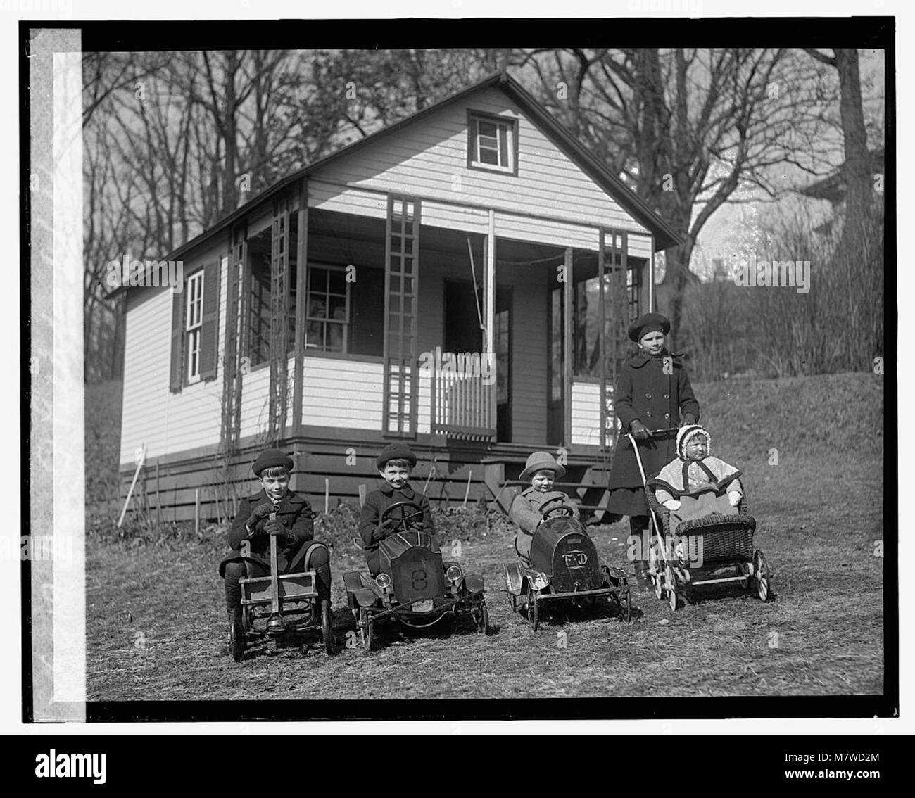 The image depicts children from the Wm. Phillips family, capturing ...