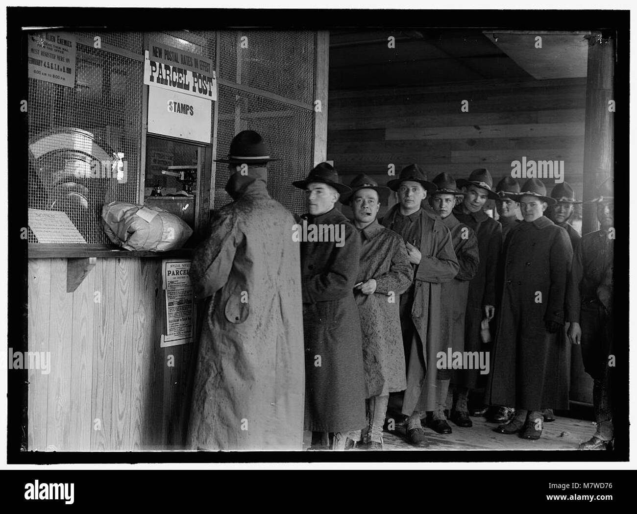 A historical photograph showing various camp activities organized by ...