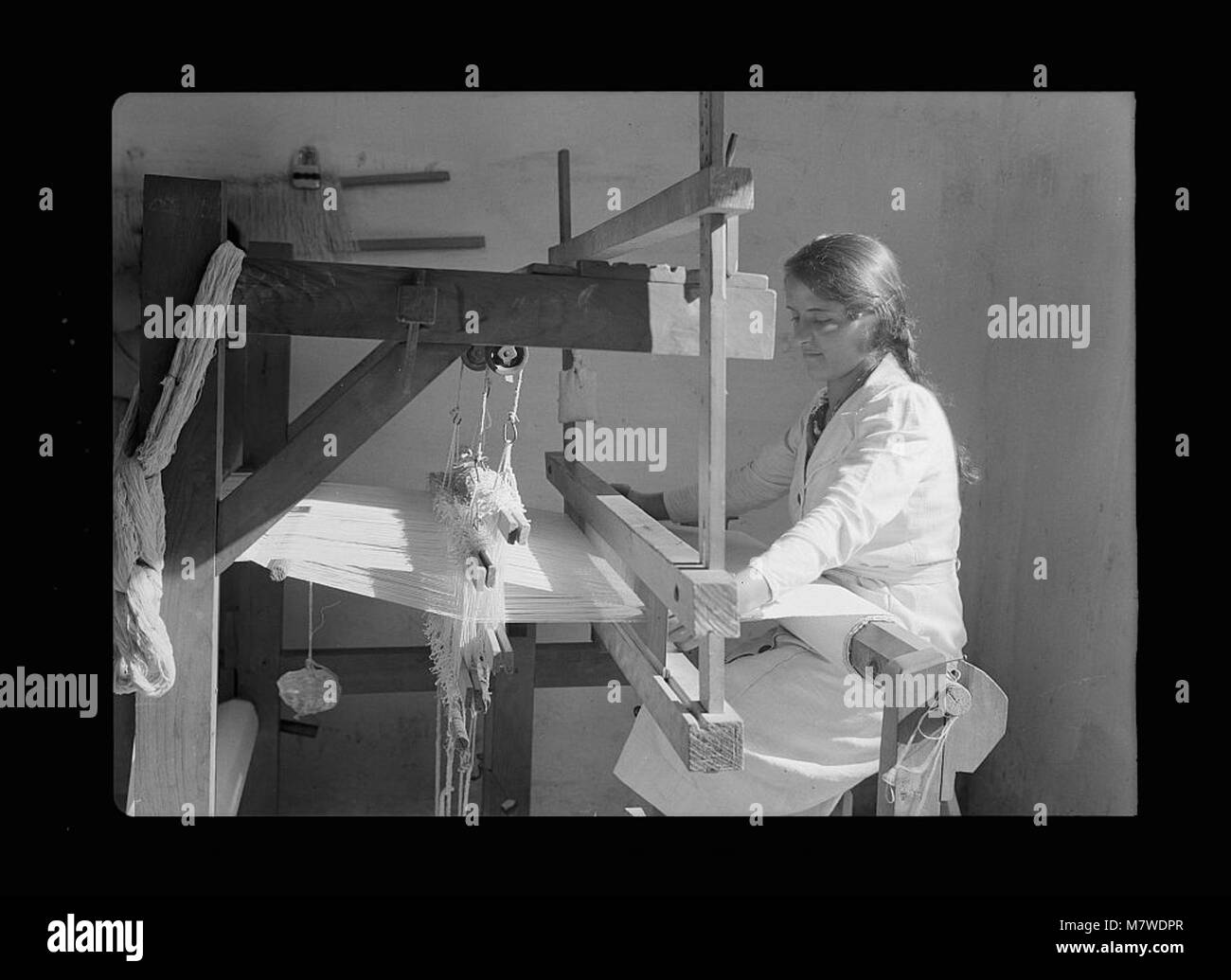 Weaving girl Black and White Stock Photos & Images - Alamy