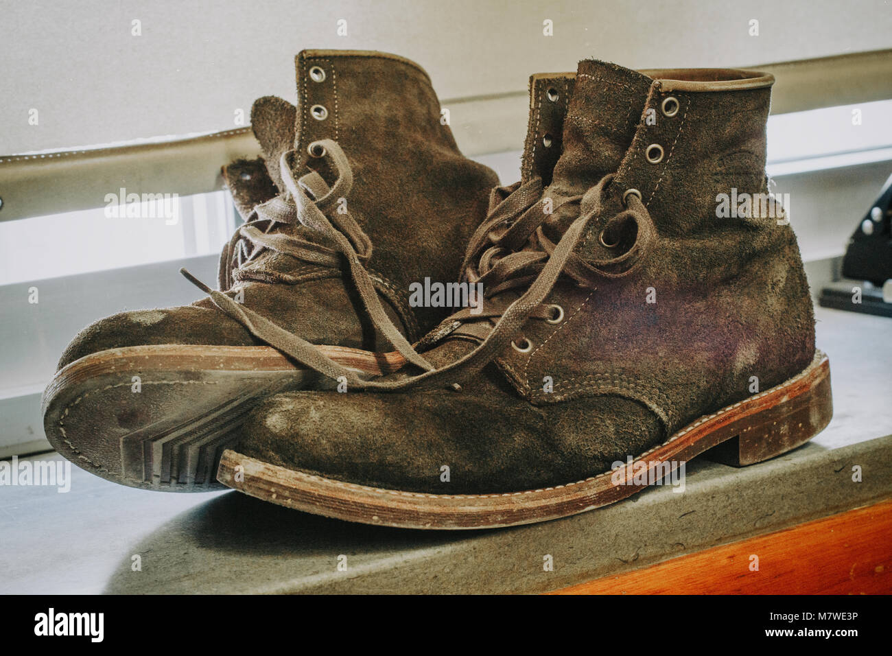 Worn Out Brown Leather Boots Stock Photos & Worn Out Brown Leather ...
