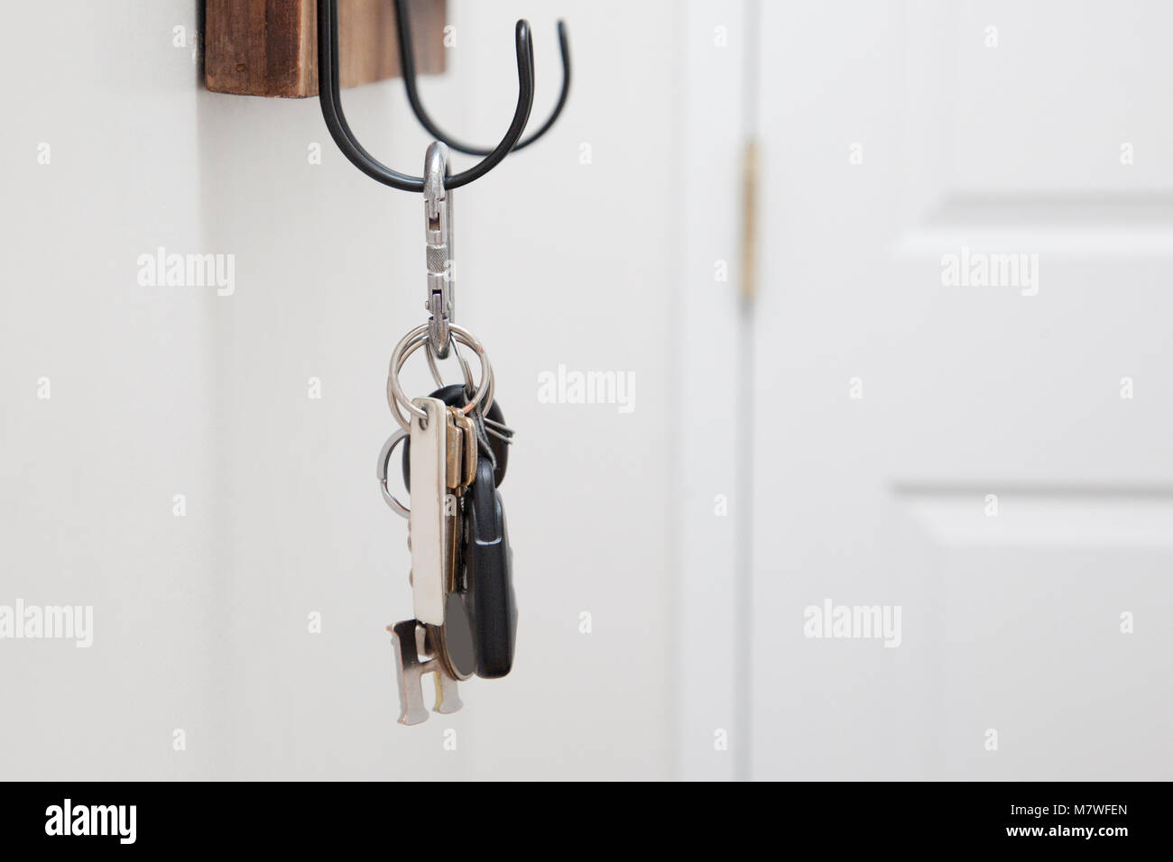 keys for home and car hang on a metal hook Stock Photo - Alamy
