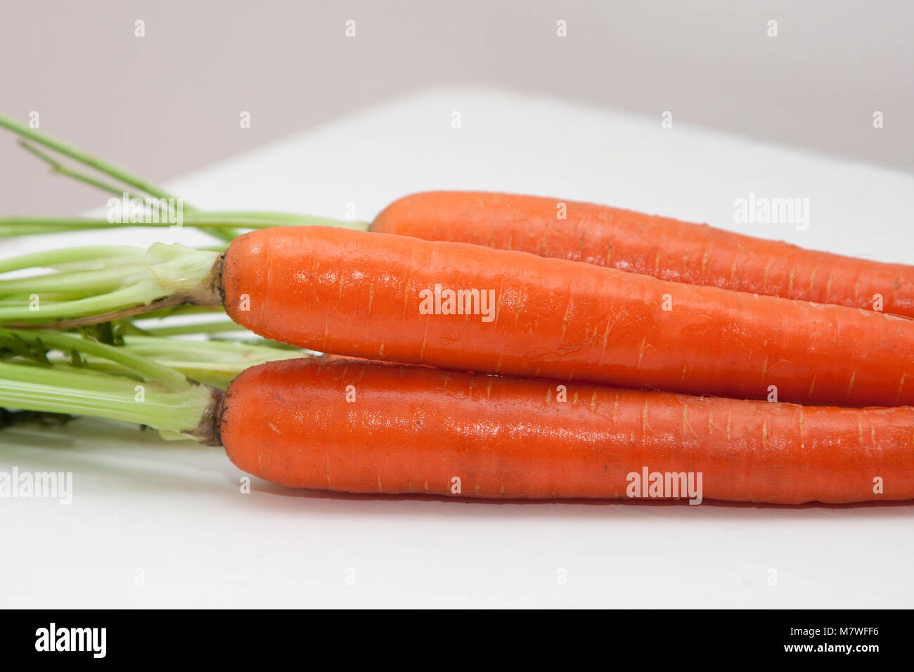 a fresh lovely bunch of healthy carrots, close up Stock Photo - Alamy