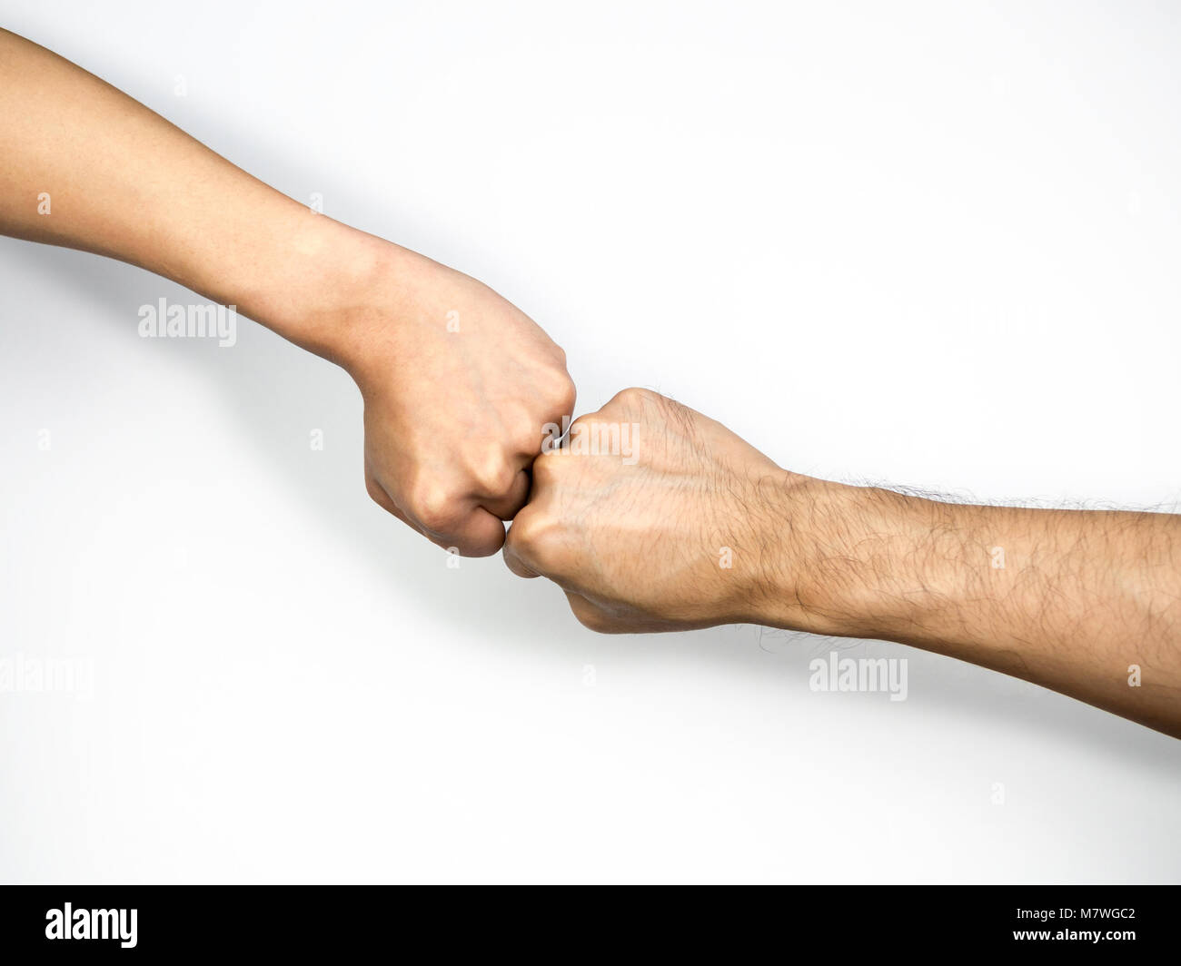 Two Male Hands Fists Together isolated on white background Stock Photo ...
