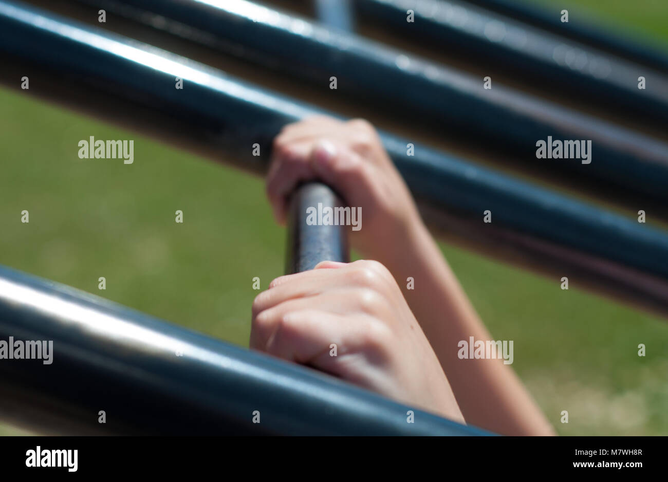 Childs Hands On Playground Equipment Stock Photo - Alamy