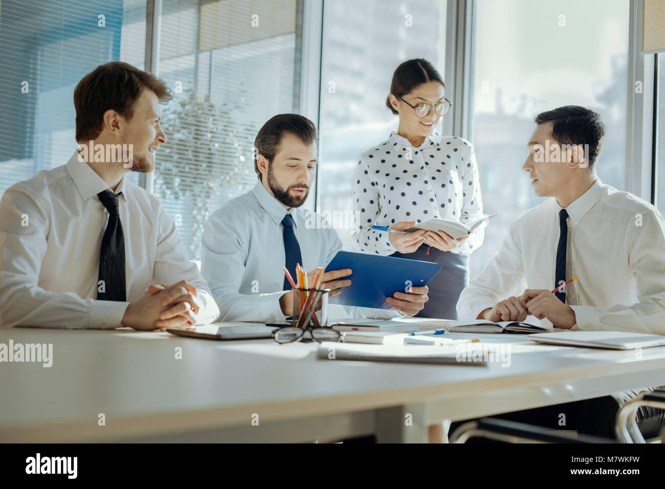 Business partners discussing cooperation perspectives Stock Photo - Alamy