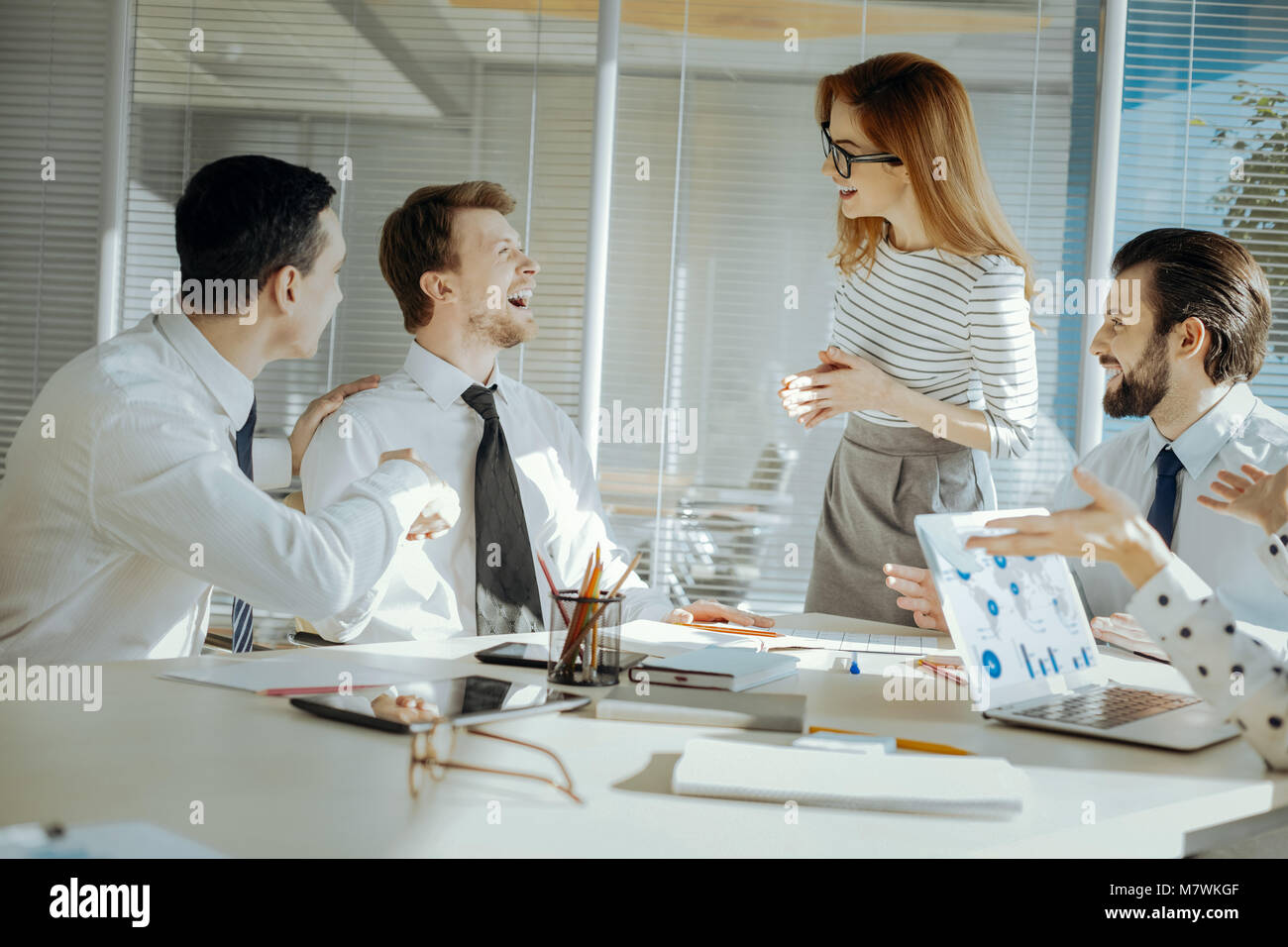 Happy teamwork hi-res stock photography and images - Alamy